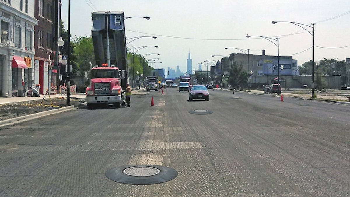 Manhole risers, safety ramps help Chicago maintain streets, reduce lane ...