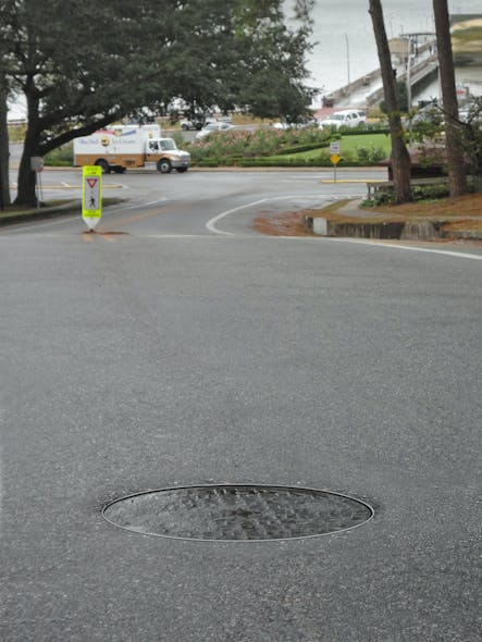 Adjustable risers keep manholes at-grade in Fairhope, Alabama | Roads ...